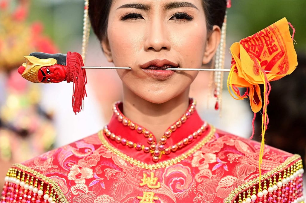 Thailand Taoist festival known for extreme piercings returns after ...