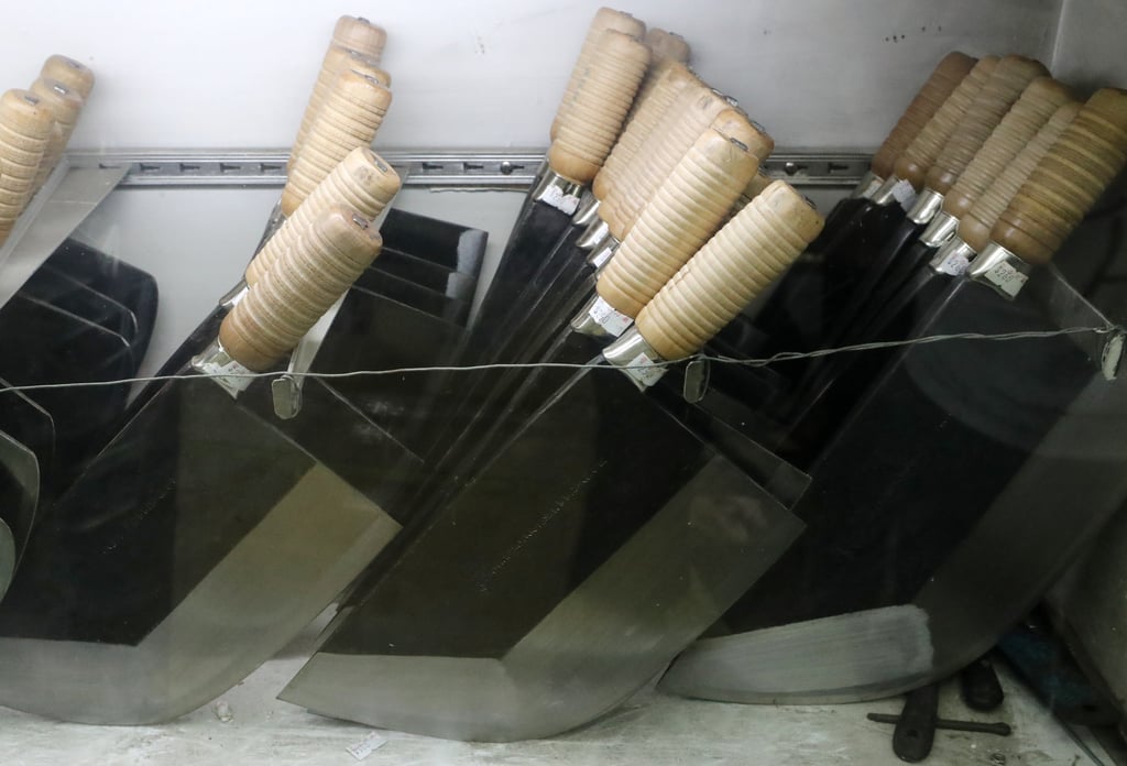 Getting the chop: removal of neon sign over Hong Kong meat cleaver shop ...