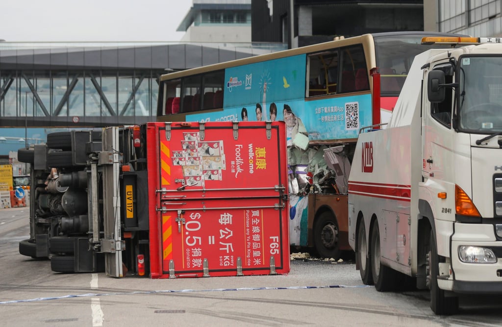 7 injured after truck collides with KMB bus and topples over in Hong ...