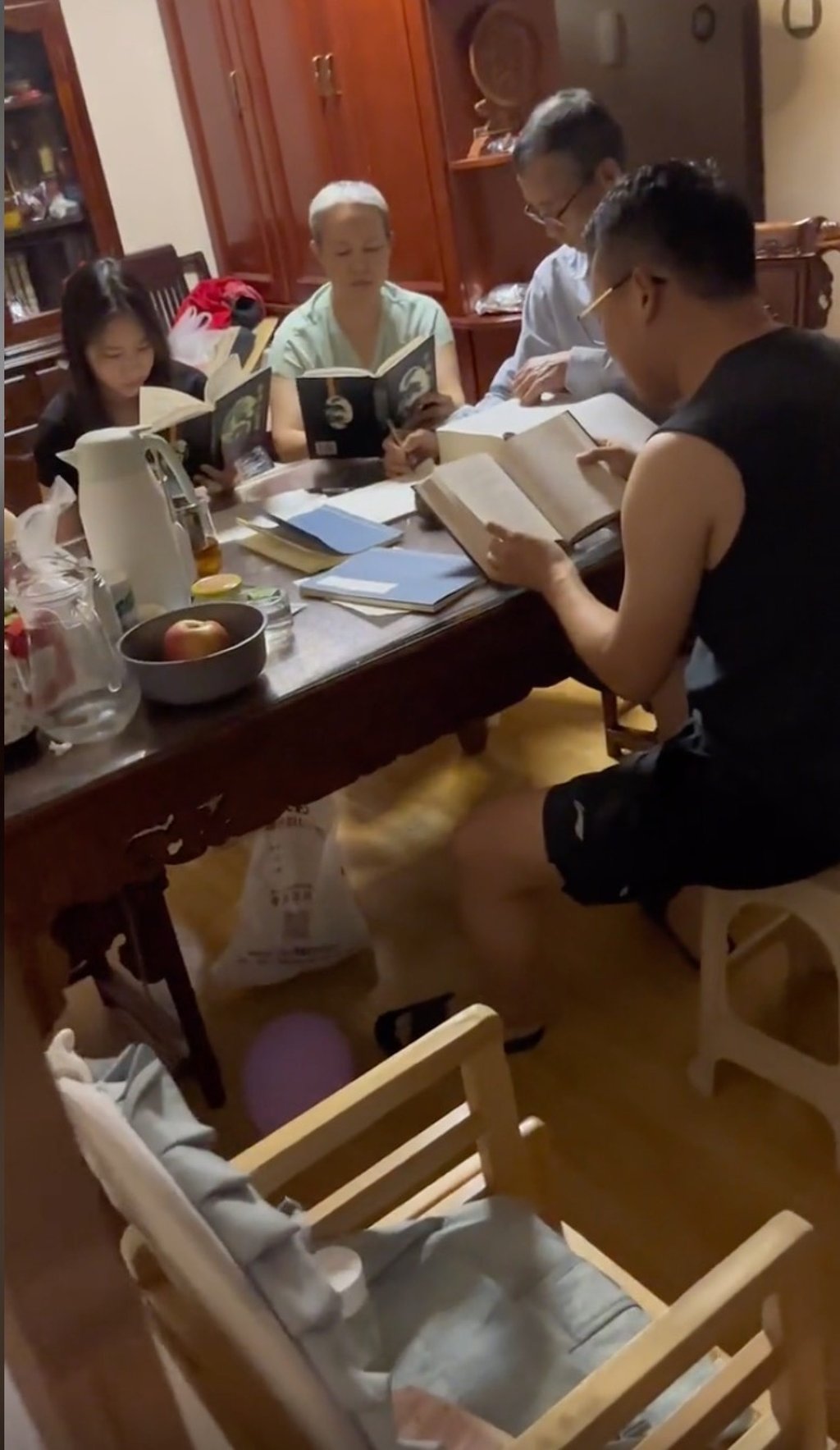 Family in China spend 3 nights buried in books in search of names for ...