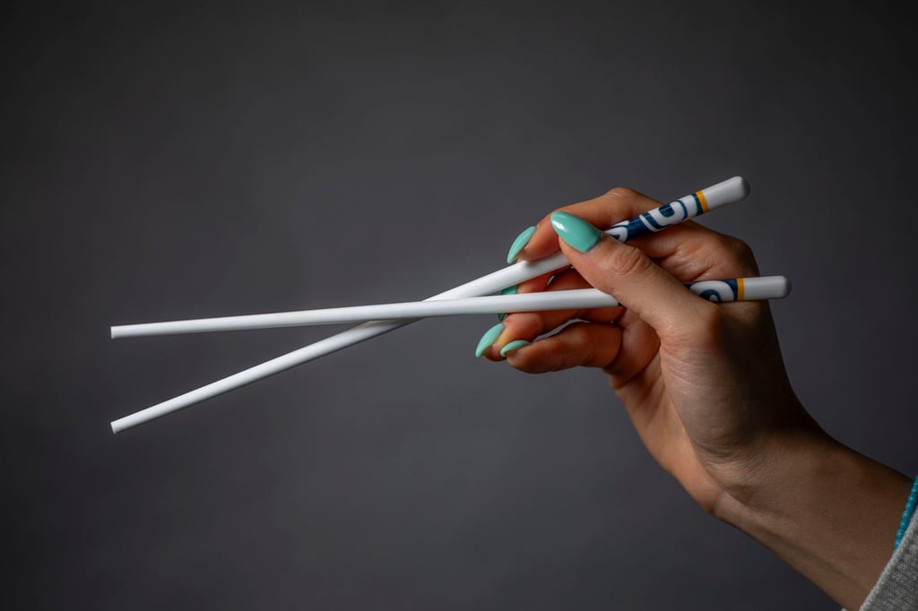 How to hold chinese sticks store