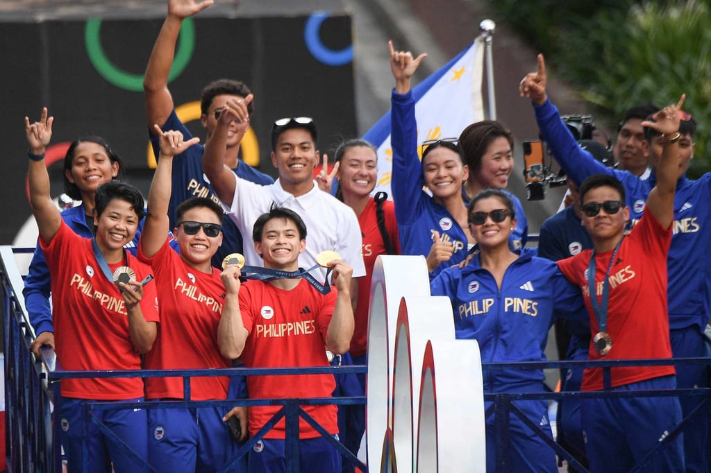 Thousands jam streets as Philippines holds parade for Carlos Yulo, 2 ...