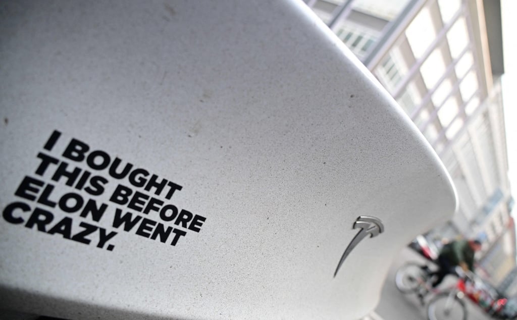 Tesla dethroned by China’s BYD as world’s top EV maker amid Musk’s ...