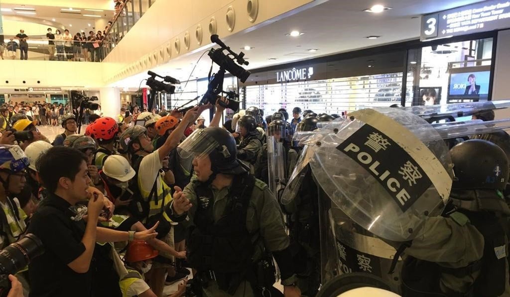 Phone-snatching lawmaker Ted Hui cleared by party disciplinary panel ...