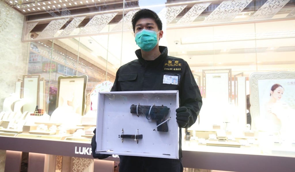 Fake gun leads to foiled robbery as quick-thinking Hong Kong jewellery store staff subdue ...