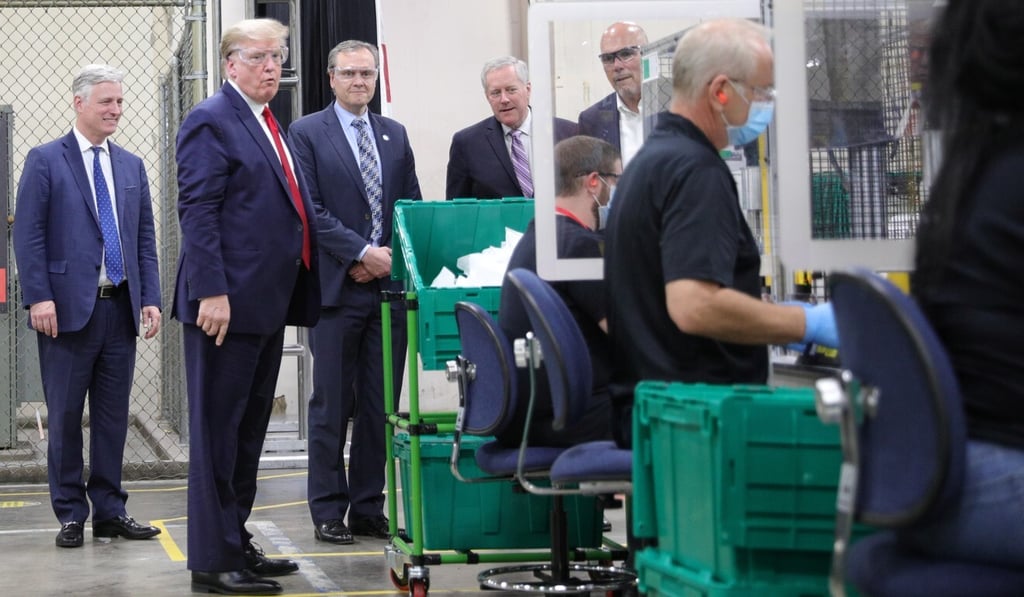 Coronavirus: Donald Trump says he wore mask at factory but took it off ...