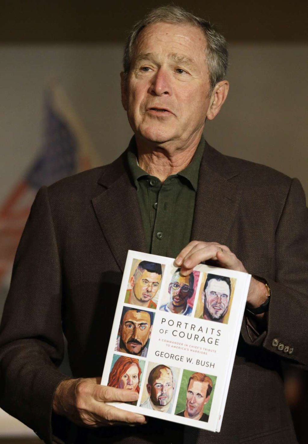 George W. Bush goes from painting dogs to portraits of US war veterans ...