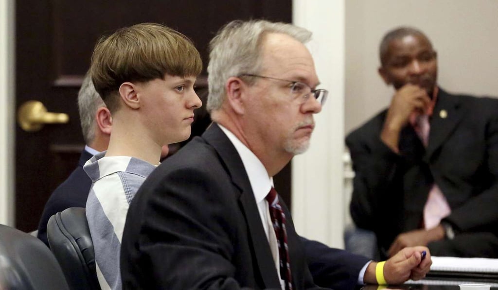 Racist Dylann Roof pleads guilty, gets nine life sentences for killing ...