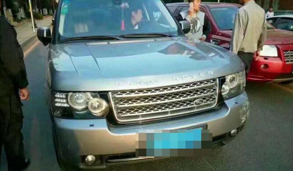 Two Chinese pupils seriously injured after car ploughs into bus queue ...