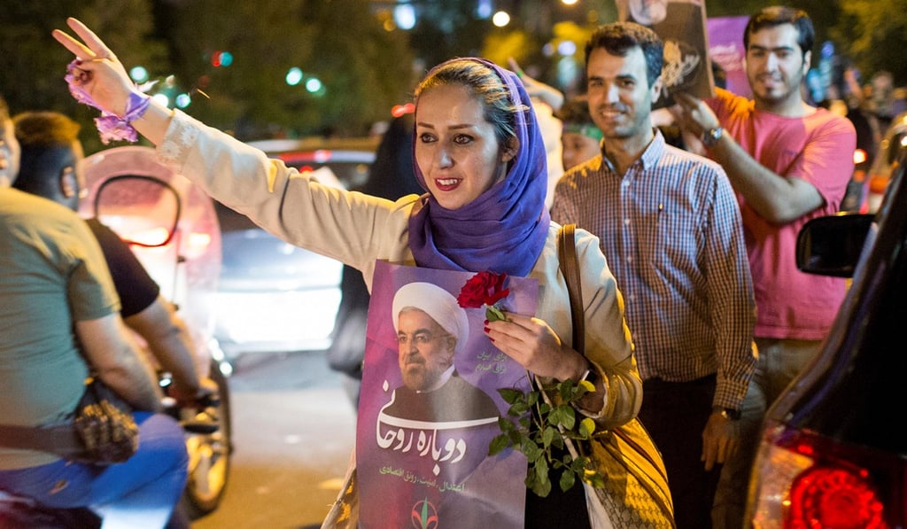 Iranian President Hassan Rowhani claims emphatic re-election as voters ...