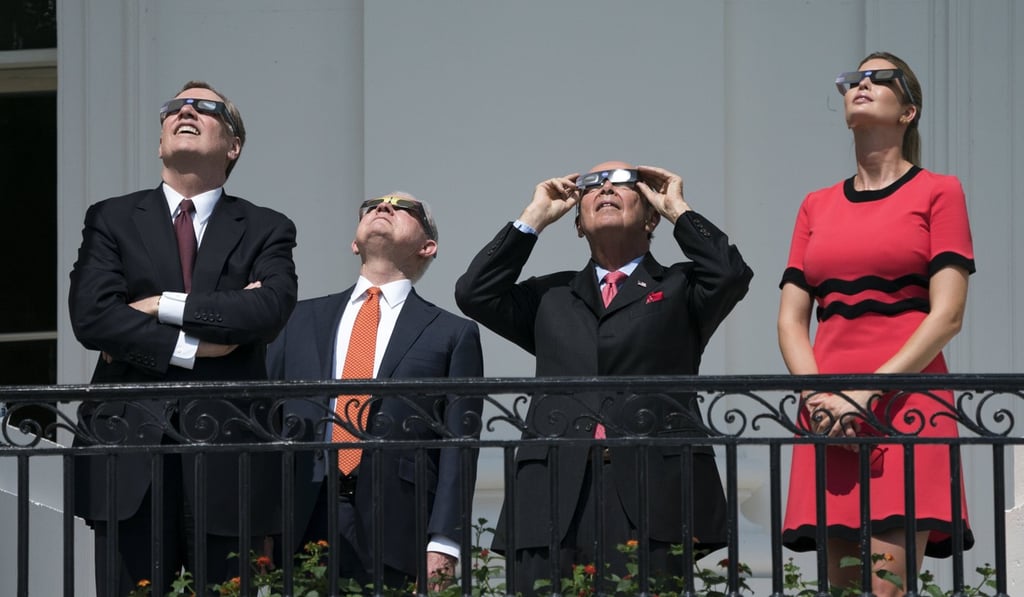 Donald Trump stares at eclipse without glasses. Don’t look, shouts a ...