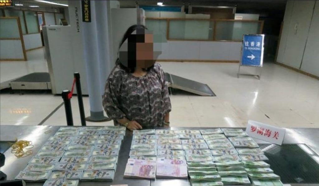 Women with banknotes taped to their bodies tried to carry more than HK ...