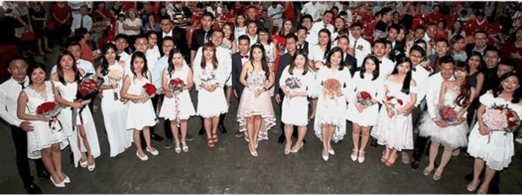 Sisters among 26 couples to tie the knot at Malaysian mass wedding ...