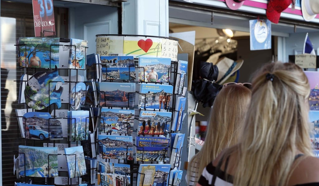 French feminists denounce smutty seaside postcards, saying they are ...