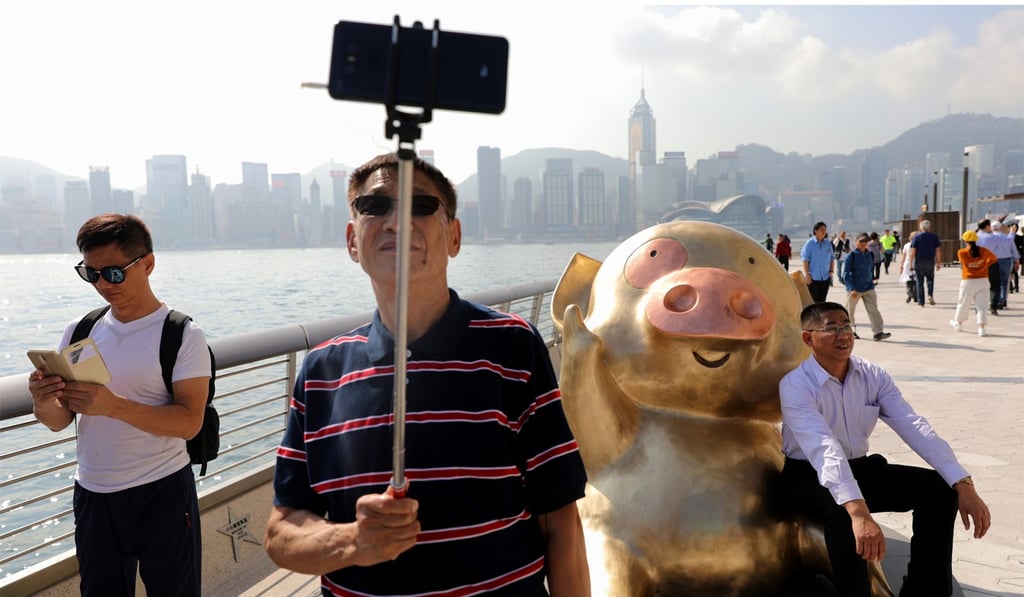 Tourists flock to Hong Kong’s reopened Avenue of Stars to get closer to ...