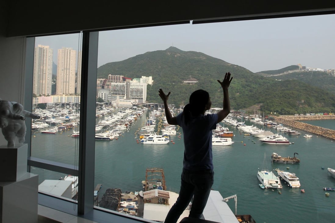 Residents of luxury Hong Kong high-rise terrified by falling panes of ...