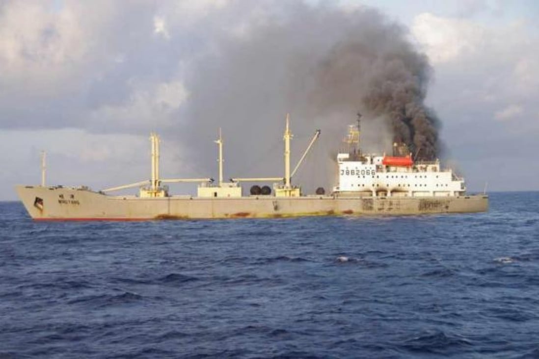 Japan's coastguard saves Chinese crew as cargo ship Ming Yang burns ...