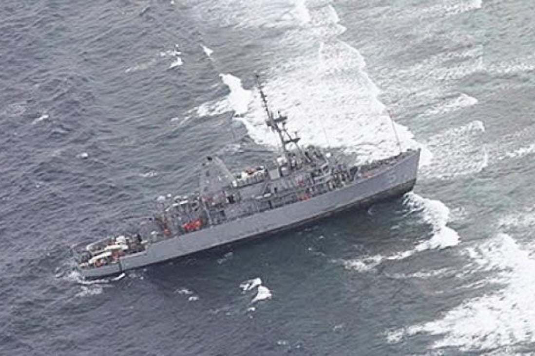 US Navy ship remains stuck on coral reef in Philippines | South China ...