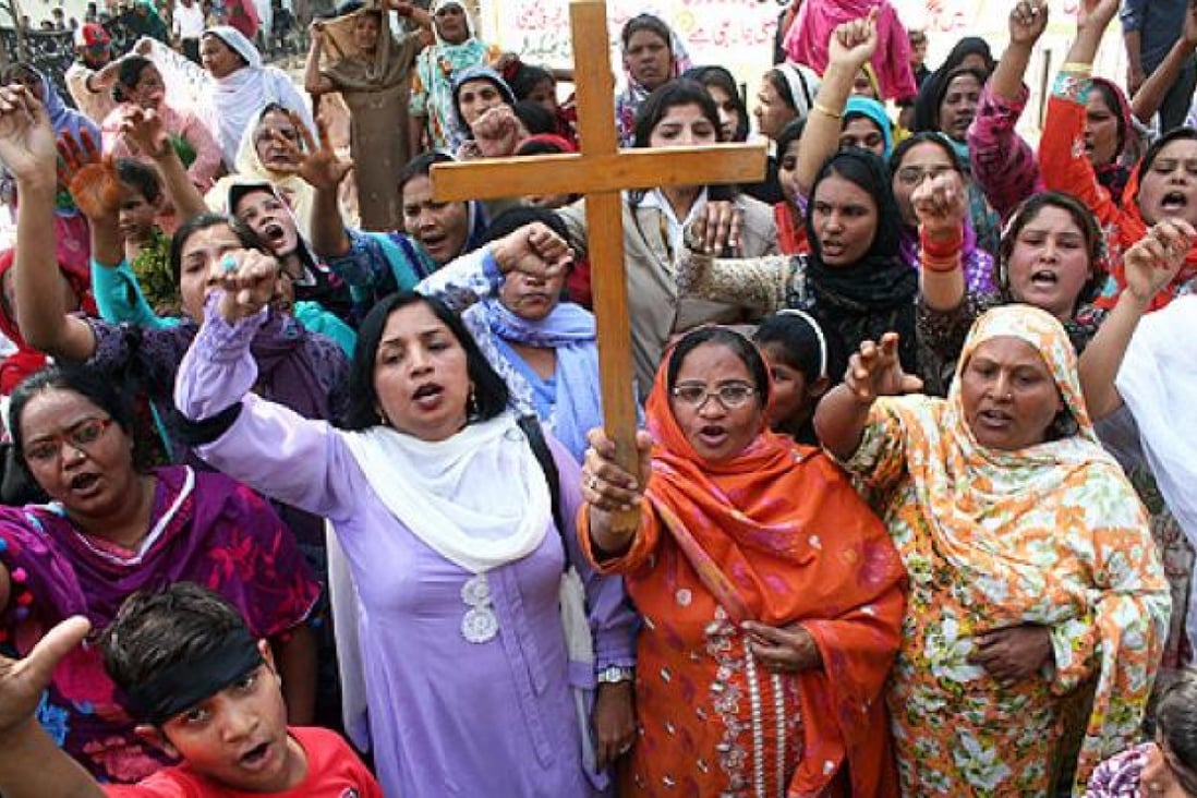 Pakistan Christians close schools to protest over riot | South China ...