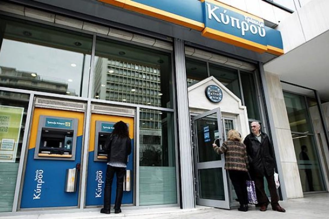 Cyprus to reopen banks, impose capital controls | South China Morning Post