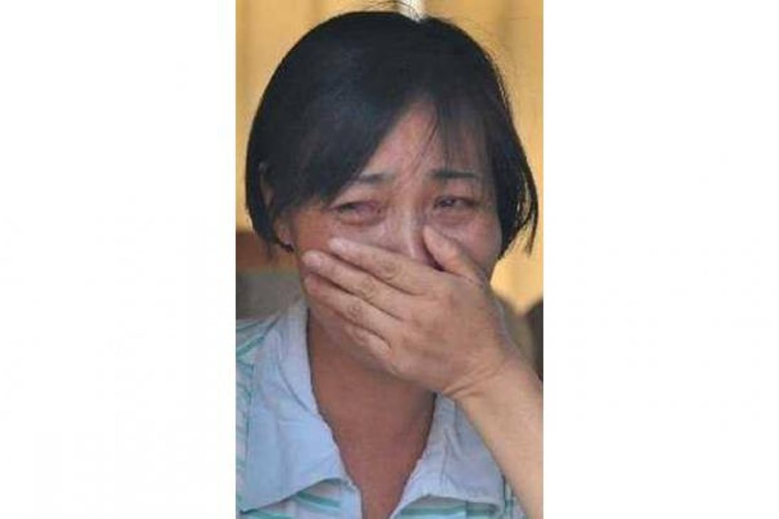 Defiant labour-camp mum Tang Hui to appeal verdict against payout ...