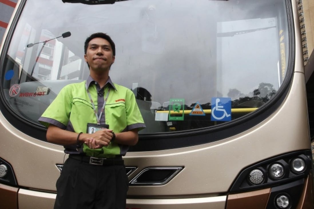 Financial analyst finds new route to happiness - as a bus driver with ...