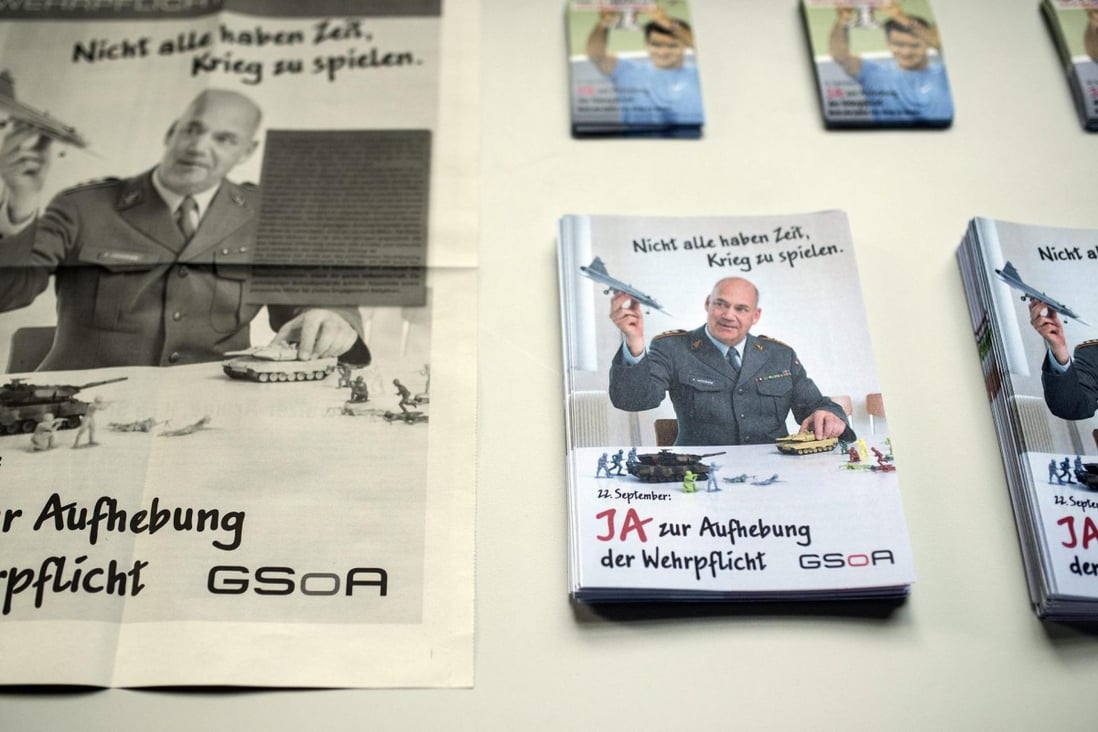 Swiss voters reject move to end conscription army | South China Morning ...