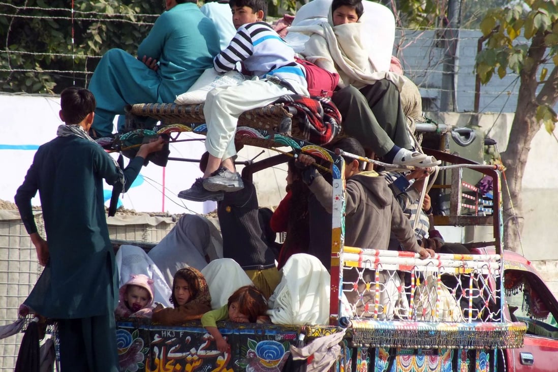 Thousands flee Pakistan tribal area fearing military action | South ...