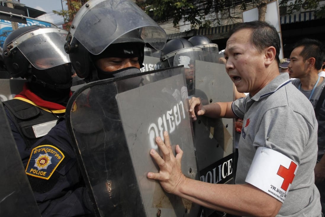 Thai police clear anti-government protesters from major Bangkok road ...