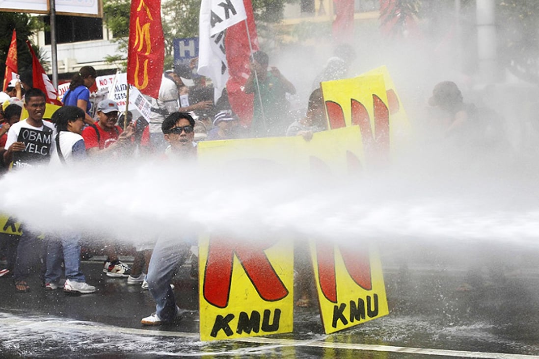 Anti-Obama protesters in Manila clash with police | South China Morning ...