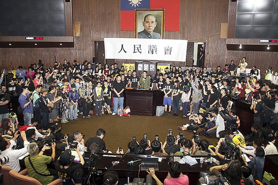 Taiwan activists peacefully exit parliament after weeks-long occupation ...