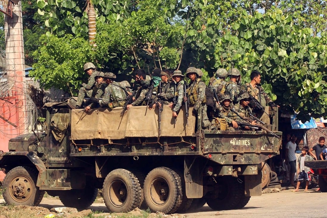Death toll in Philippine assault on militants rises to 26 | South China ...