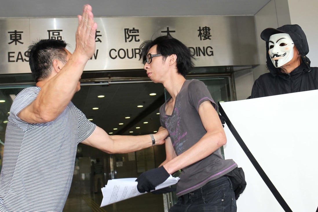 Activist who trespassed in PLA barracks attacked outside court | South China Morning Post