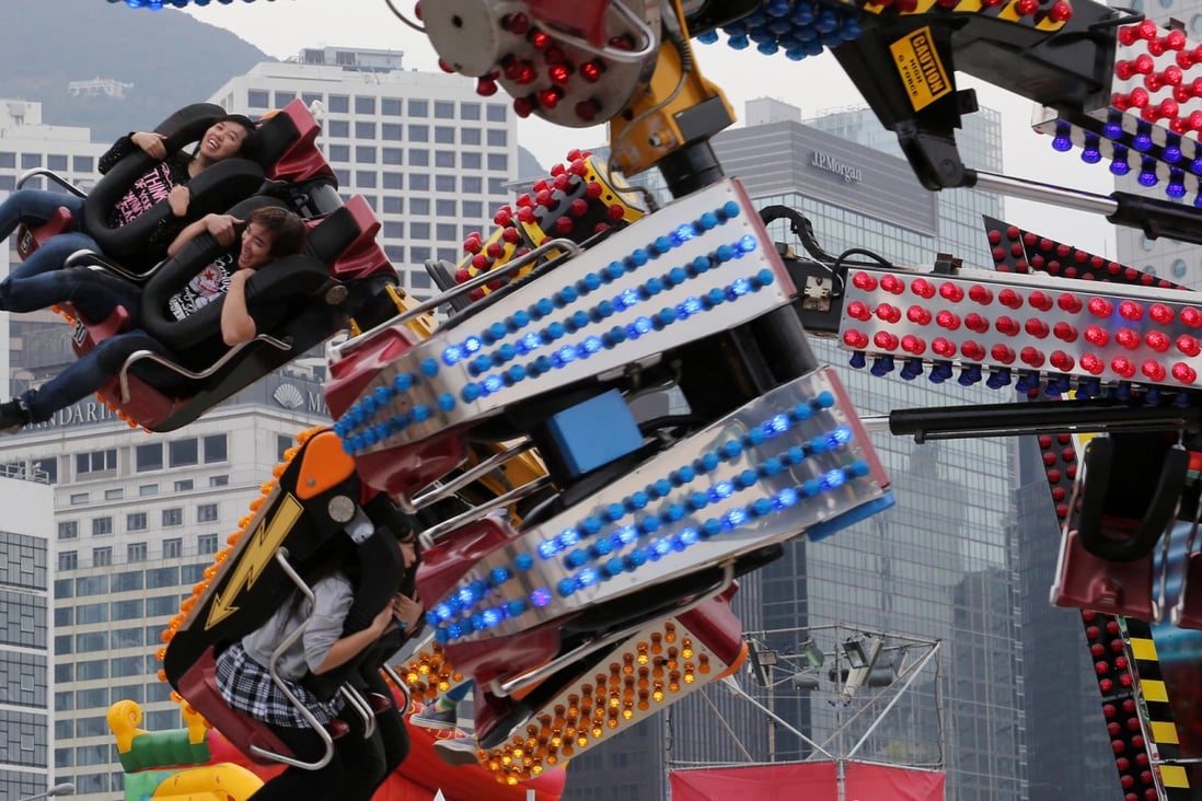 Hong Kong's carnival dismisses safety fears after riders trapped ...