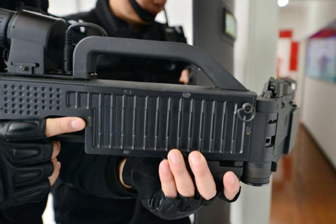 Shanghai police train with ‘bendable guns’ that can shoot around ...