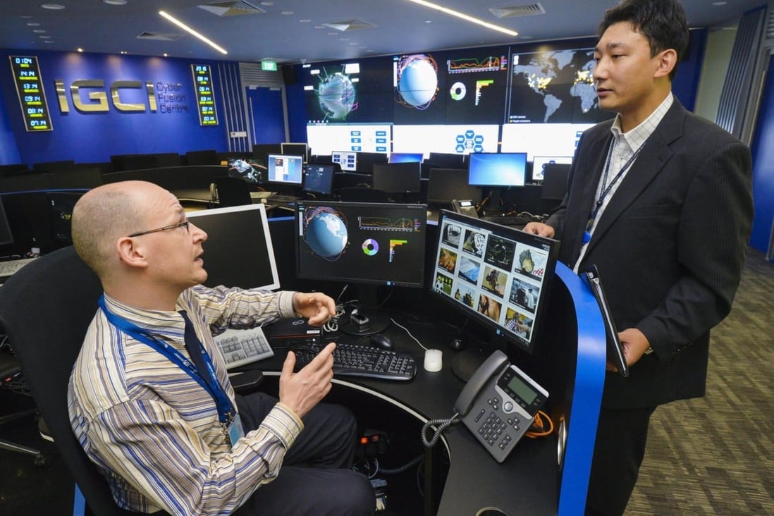 Interpol opens new Singapore headquarters in bid to target cybercrime ...