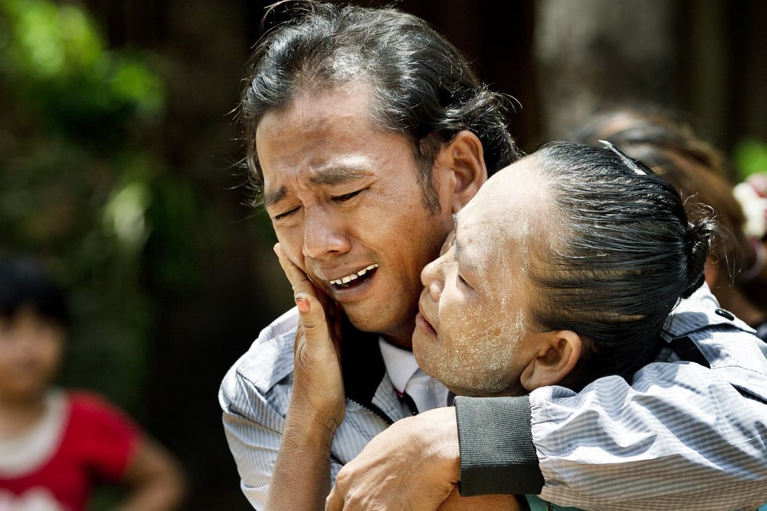 Moment Myanmar fisherman is reunited with his mother after 22 years as ...