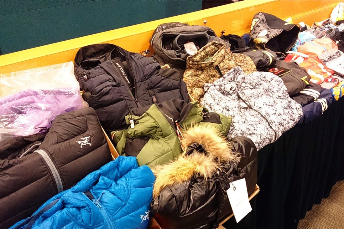 Fake goods sold in flat at prime Hong Kong shopping area of Causeway ...