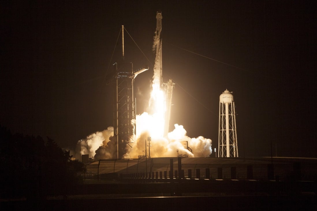 SpaceX sends crew to International Space Station, recycling rocket and ...