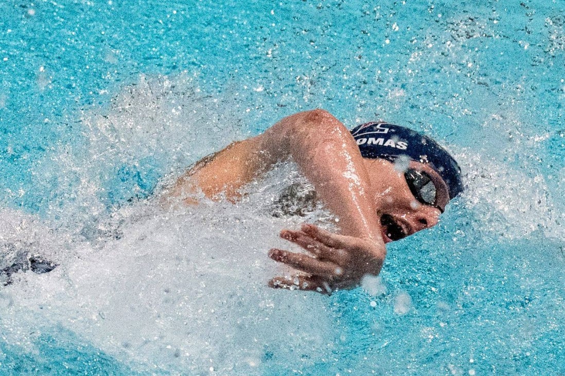 Amid protesters, swimmer Lia Thomas becomes first trans athlete to win ...