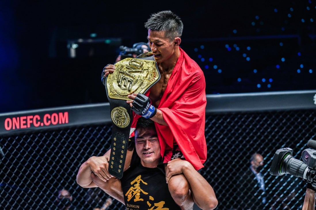 China’s first male MMA champ Tang Kai mobbed by fans on first visit ...