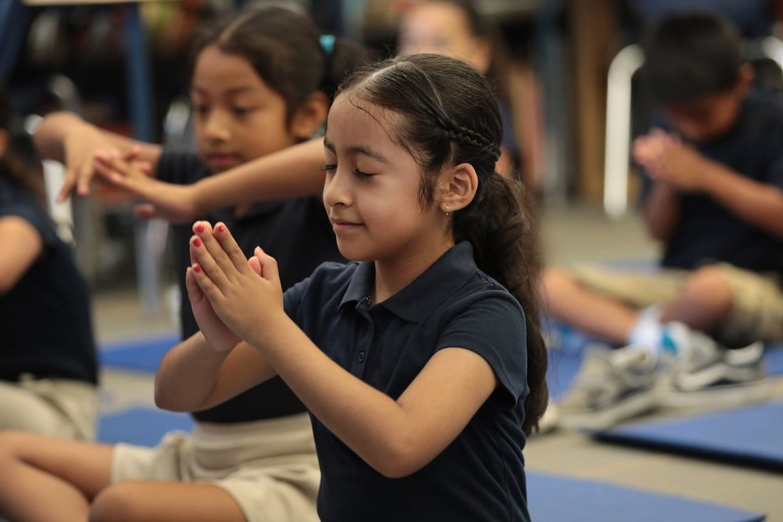The benefits of yoga for children: they’re less anxious, not as ...