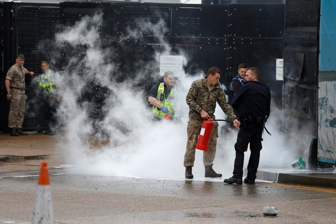 Man hurls firebombs at UK immigration centre in Dover before killing ...