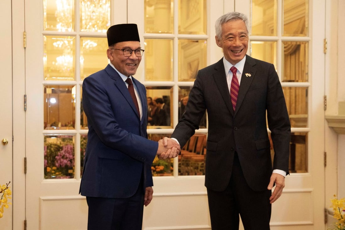 Malaysia hails close ties with Singapore as deals struck over green ...