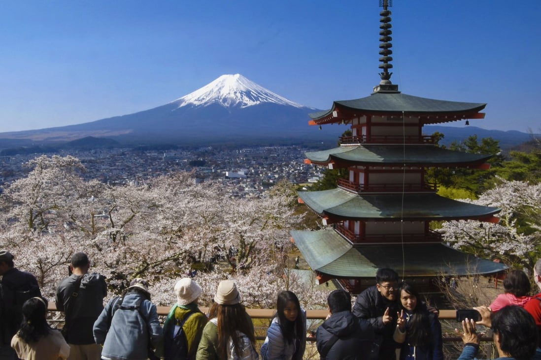 Japanese ‘mindset’ is to stay home as Covid wave, surging flight costs ...