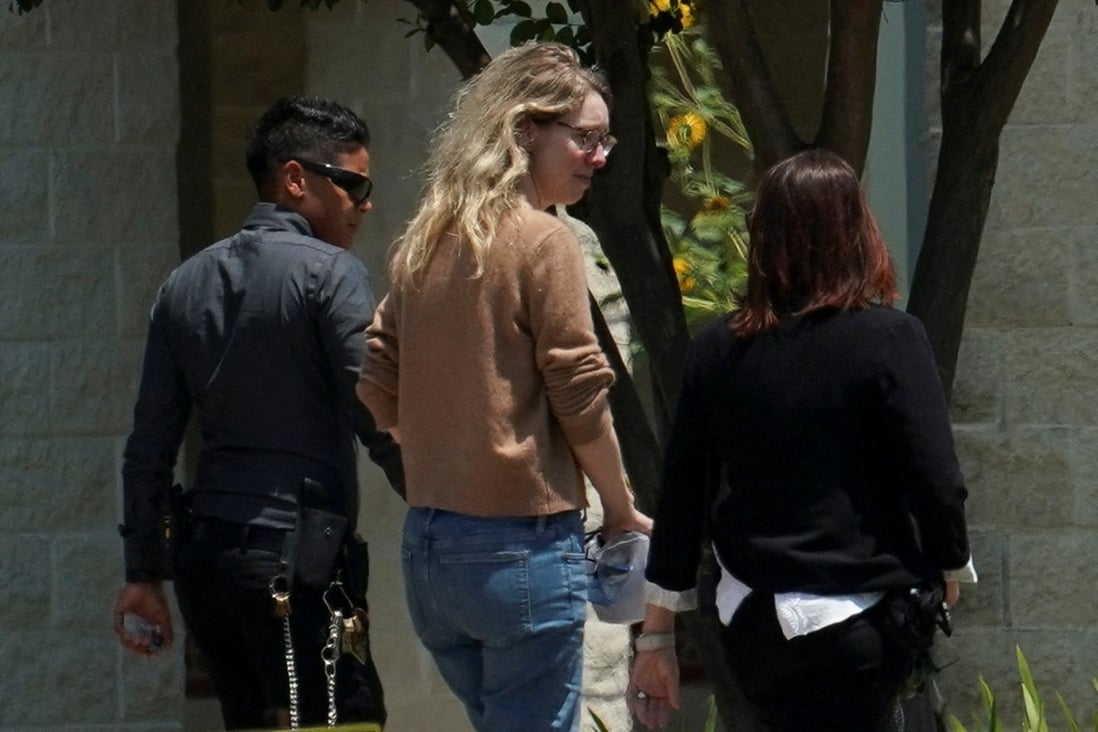 Elizabeth Holmes enters Texas prison to begin 11-year sentence for ...