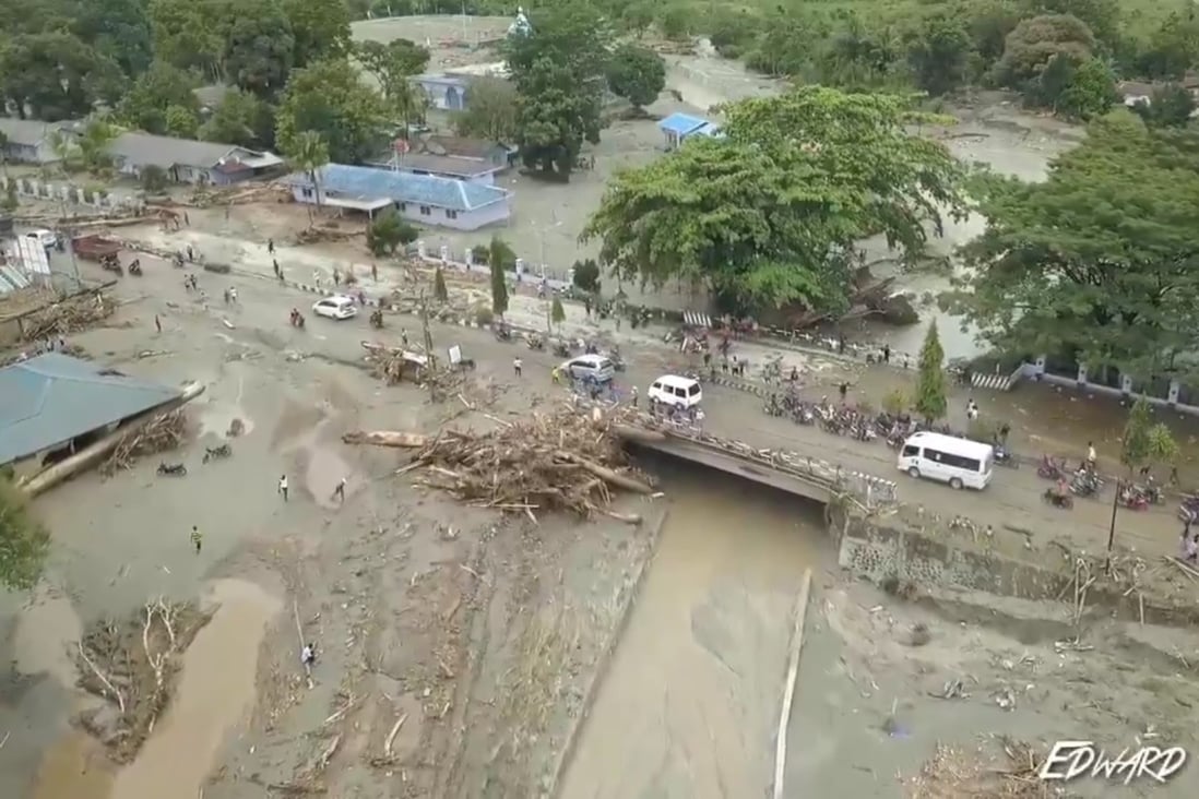 At least 58 dead, thousands homeless, after flash floods hit Indonesia ...