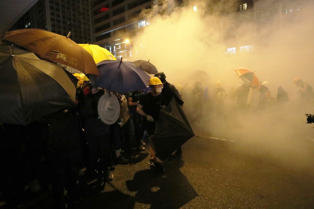 Central Hong Kong becomes battleground as riot police clash with ...