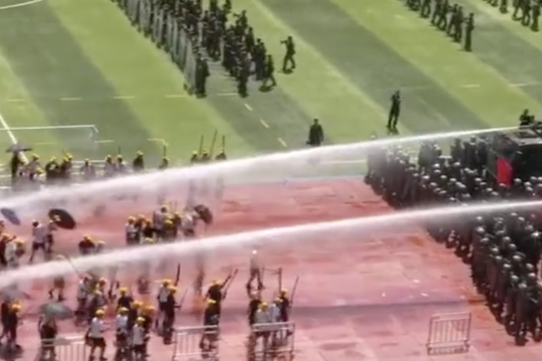 China’s paramilitary stages anti-riot drill near Hong Kong border ...