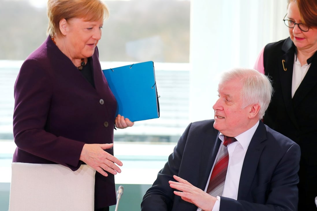 Handshake snub for Merkel as coronavirus cases rise in Germany | South ...